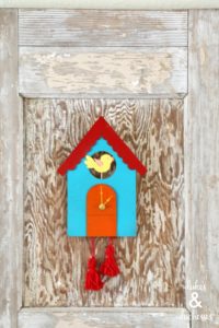 26 Unique DIY Upcycled Clocks You'll Want In Your Home - Pillar Box Blue
