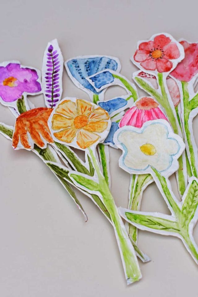 Easy DIY Painted Paper Mache Flowers in Recycled Pots - Pillar Box Blue
